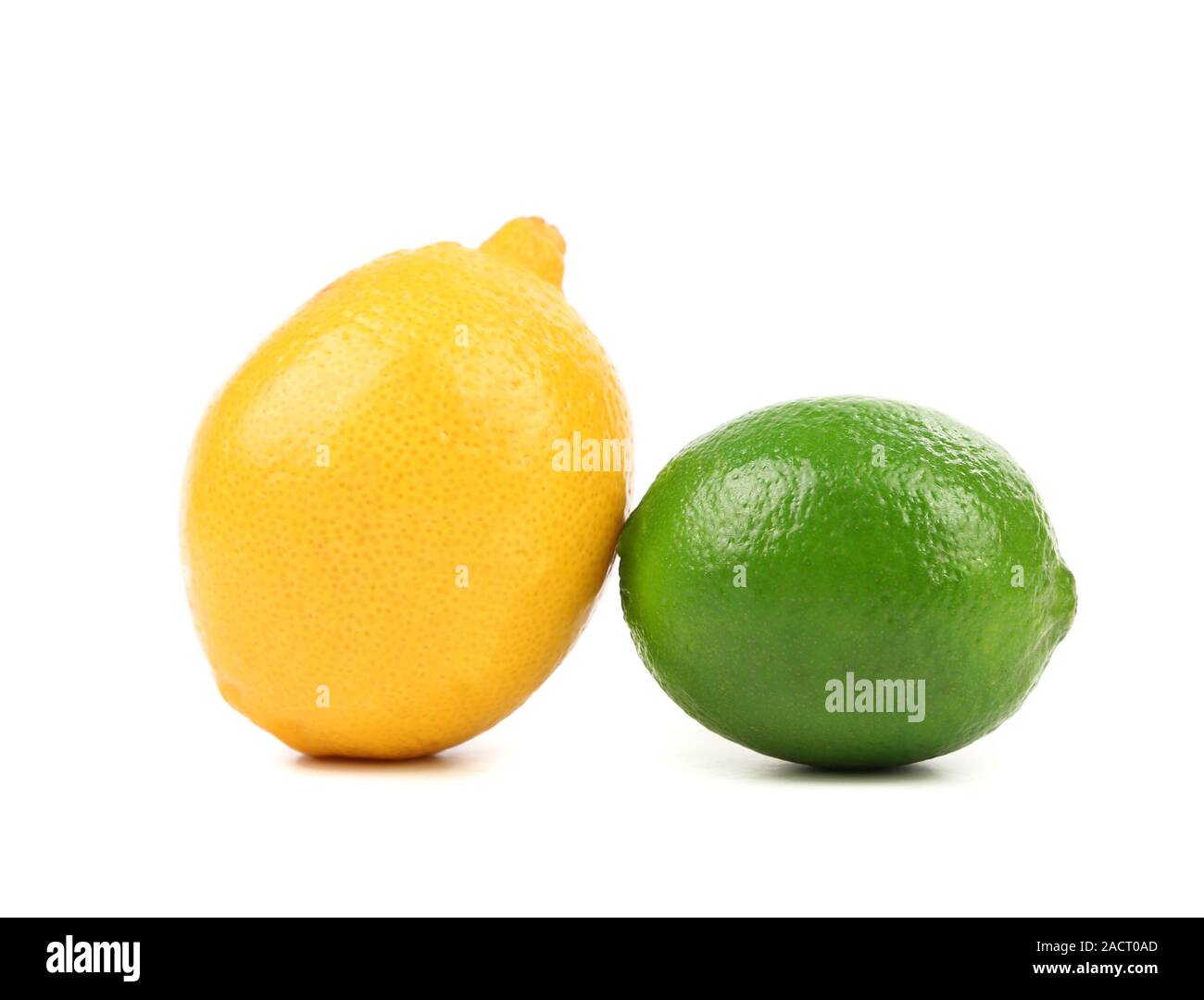 fresh lime and lemon isolated on white Stock Photo - Alamy