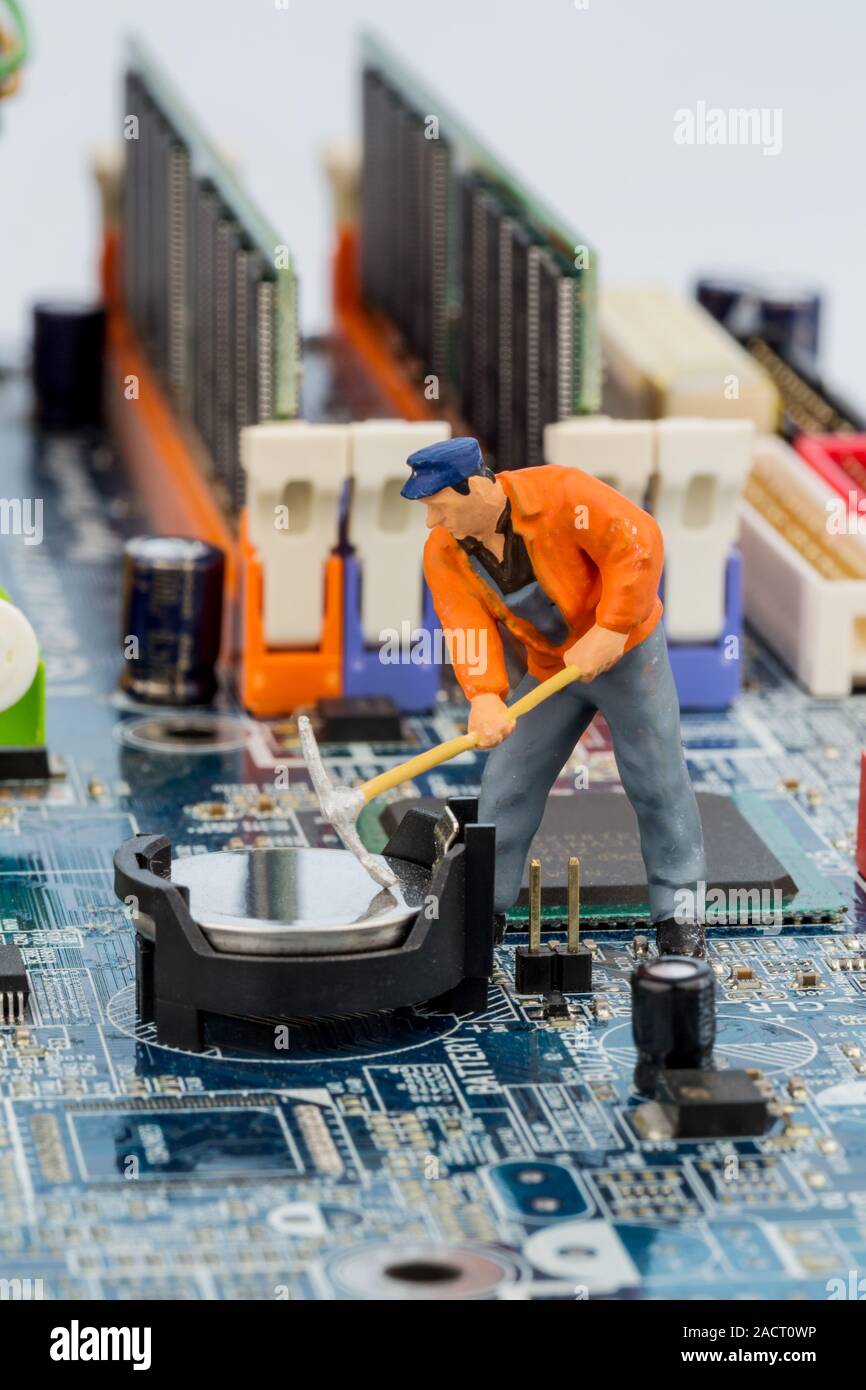 Computer board and construction worker Stock Photo - Alamy