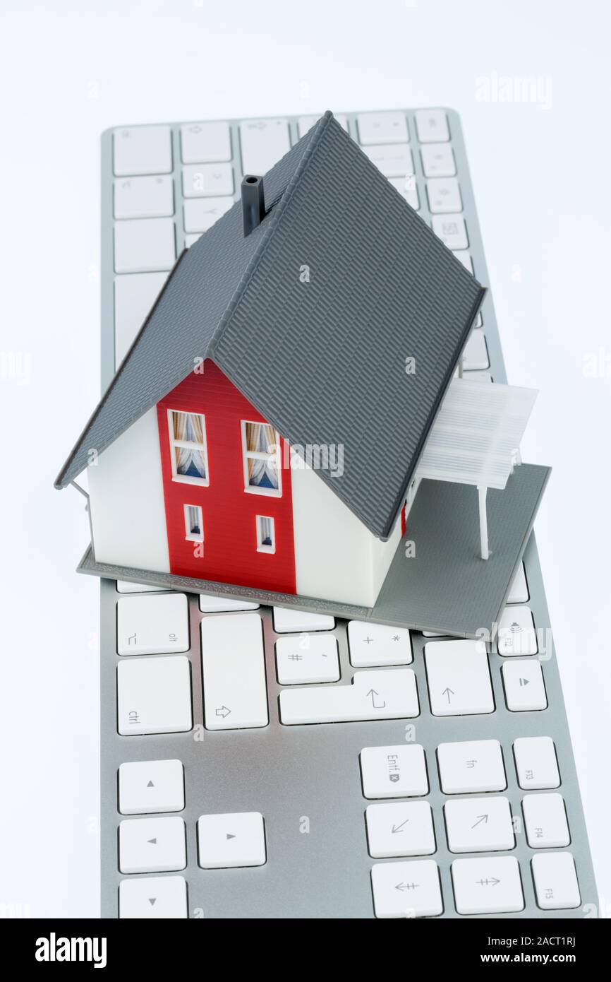 House on keyboard Stock Photo - Alamy