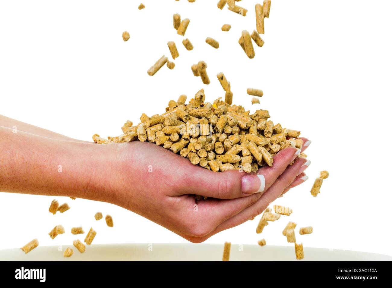 Hand with pellets as an alternative energy source Stock Photo - Alamy