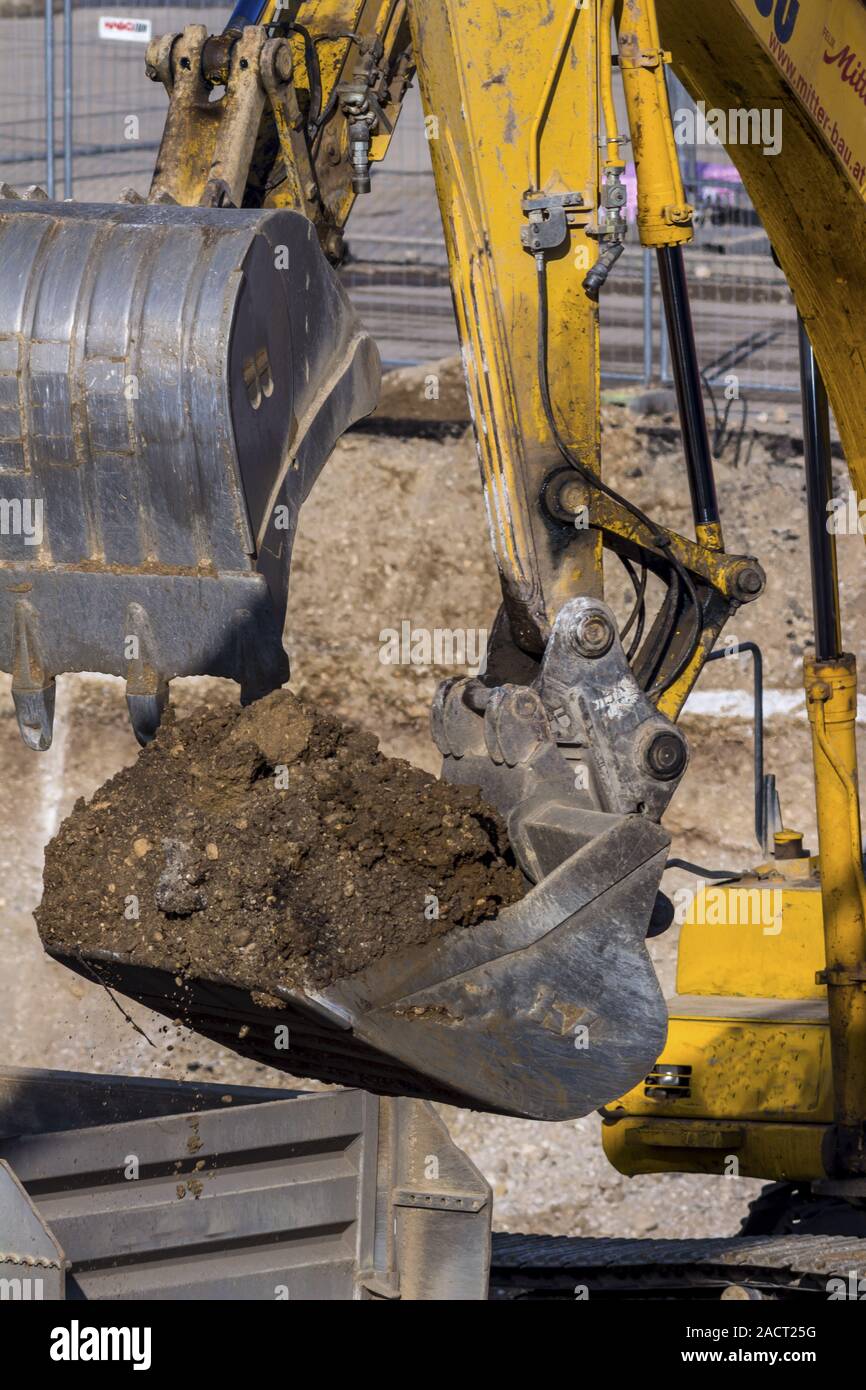 Excavator on construction site during earthworks Stock Photo - Alamy