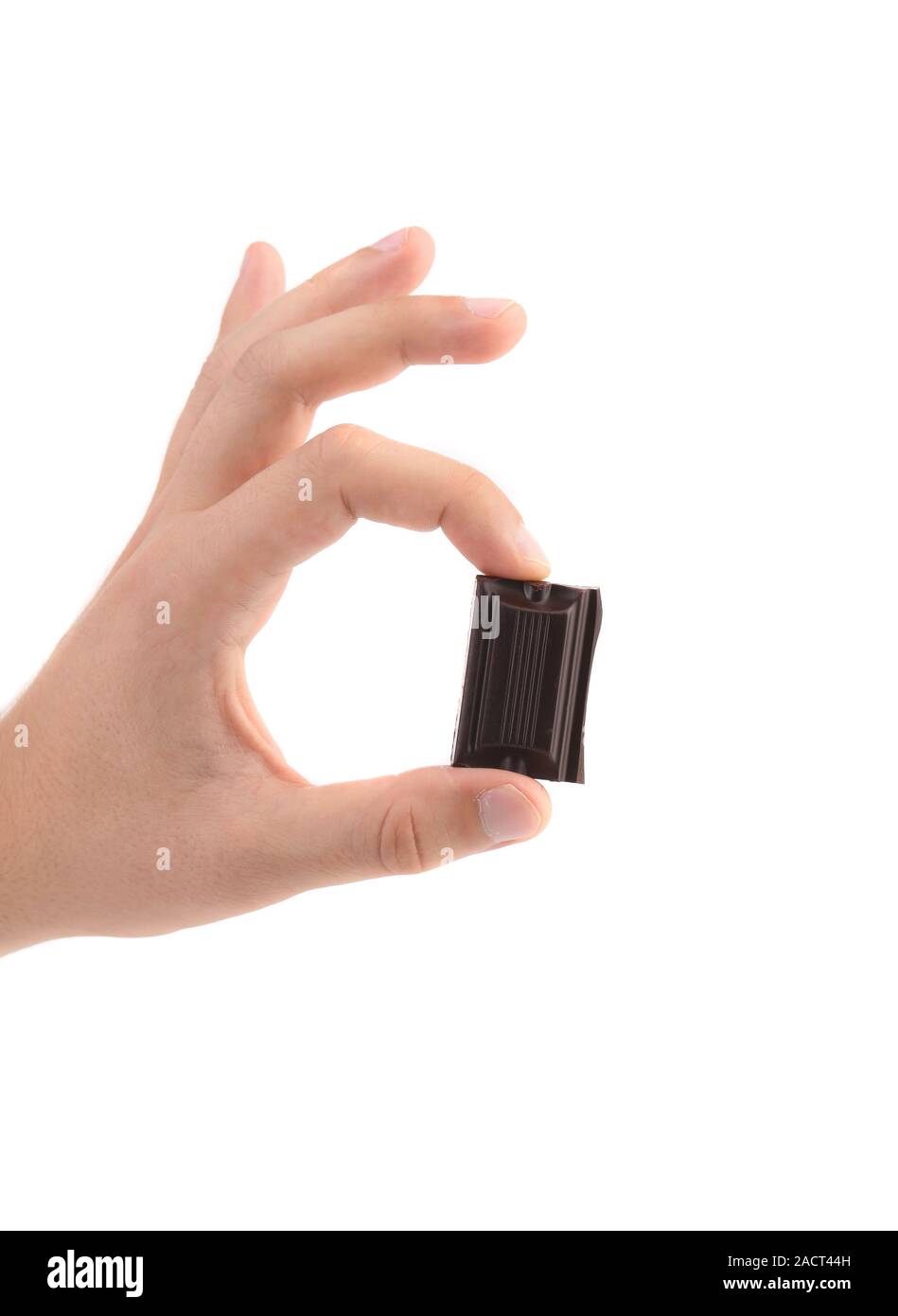 Hand holds chocolate bar Stock Photo - Alamy