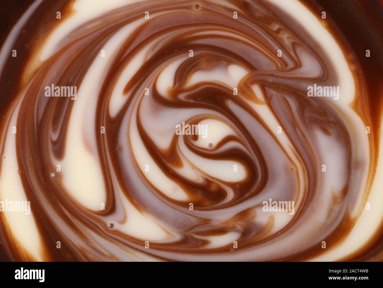 Melted chocolate pouring from cooking hi-res stock photography and ...