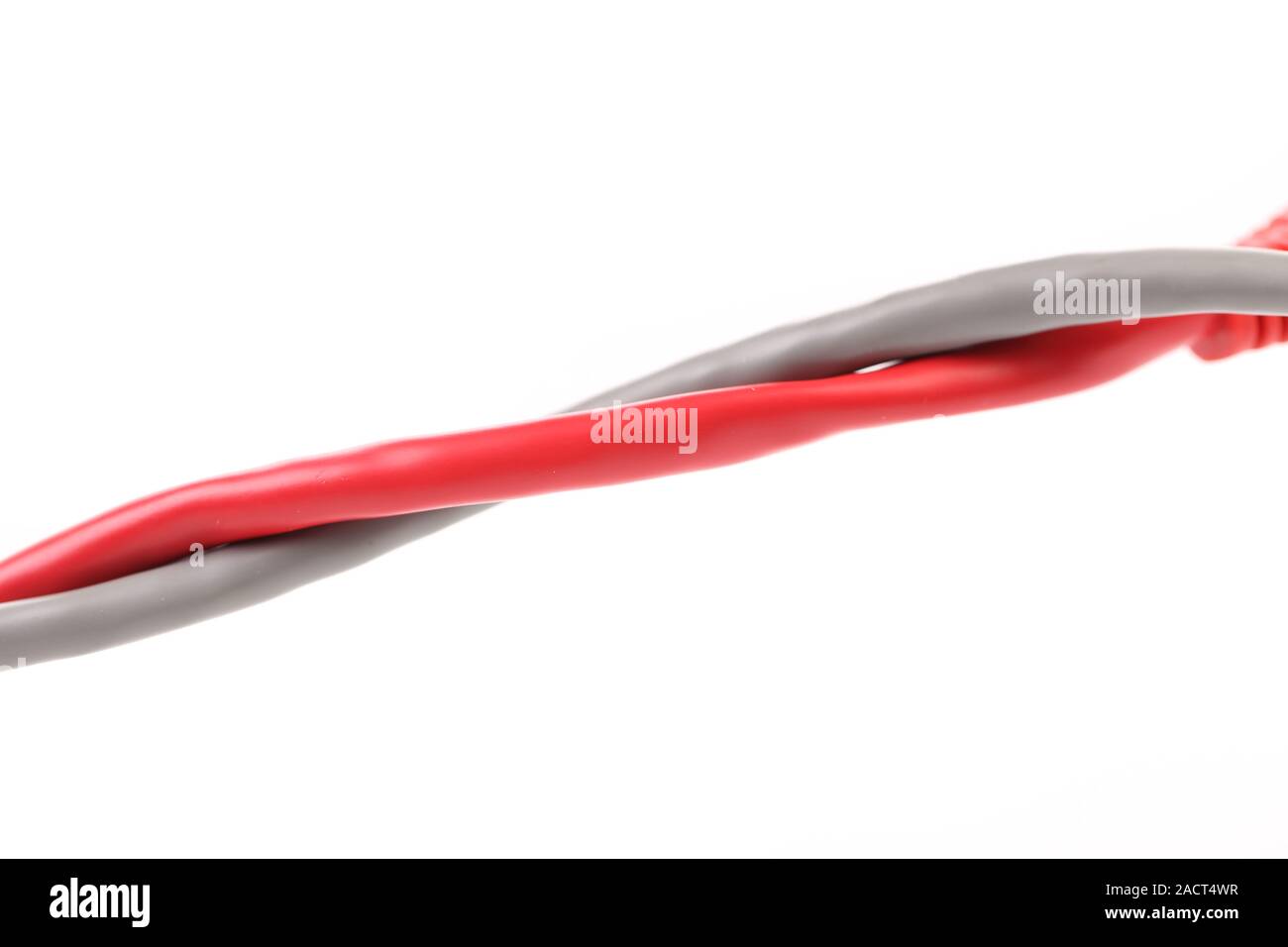 Intertwined wires on a white background Stock Photo - Alamy