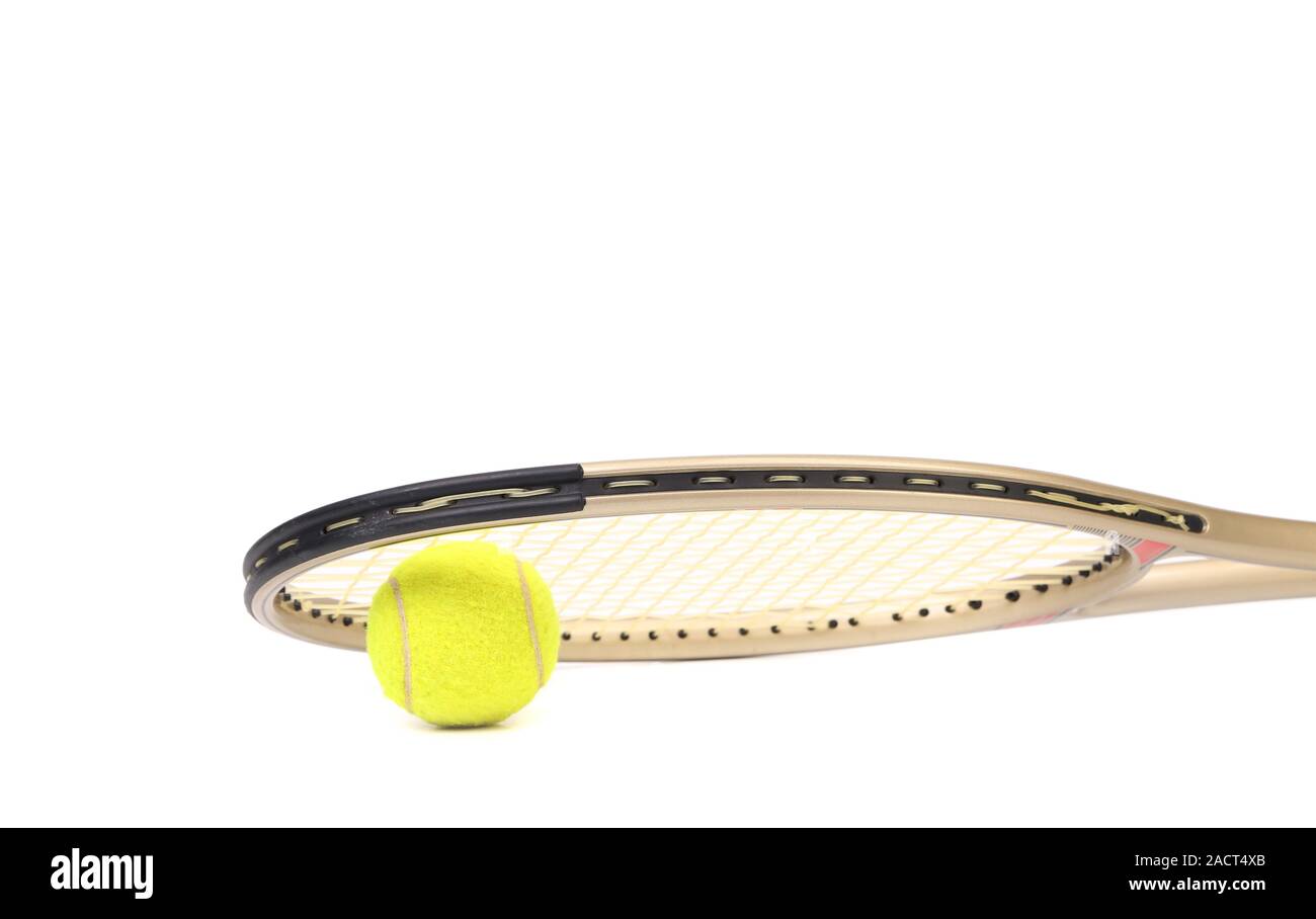 Gray tennis racket and yellow ball Stock Photo - Alamy