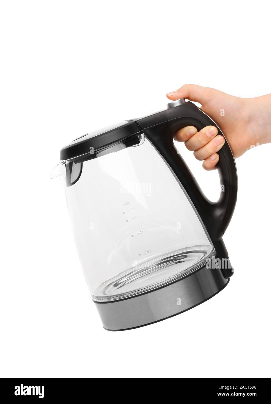 Hand holds glass electric kettle Stock Photo - Alamy