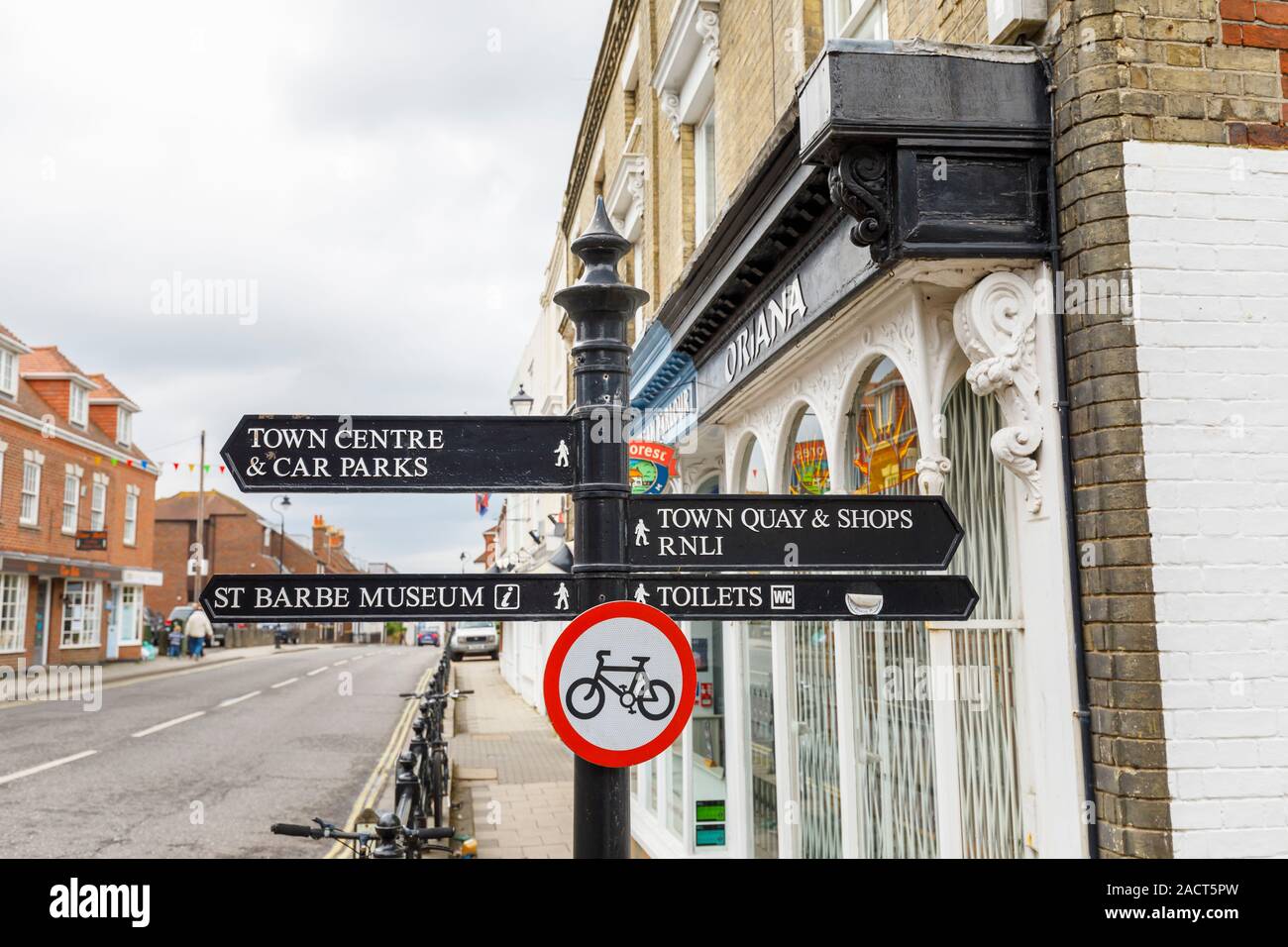Signpost pointing to local amenities and attractions in Lymington, New ...