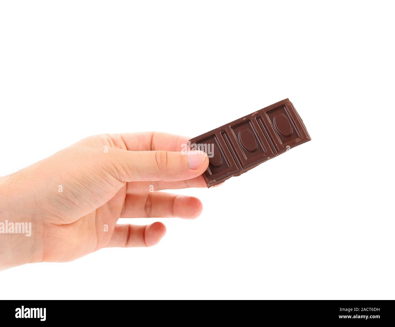 Hand holds chocolate bar Stock Photo - Alamy