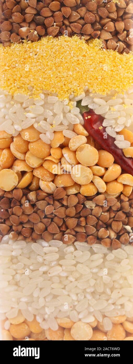 Background of different coloured seeds Stock Photo - Alamy