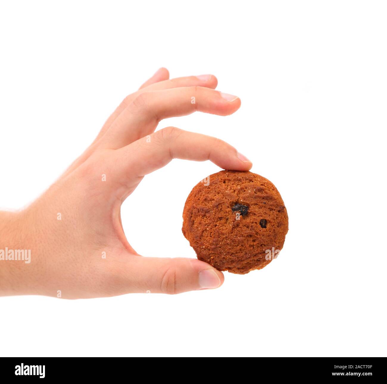 Hand hold sweet cookie Cut Out Stock Images & Pictures - Alamy