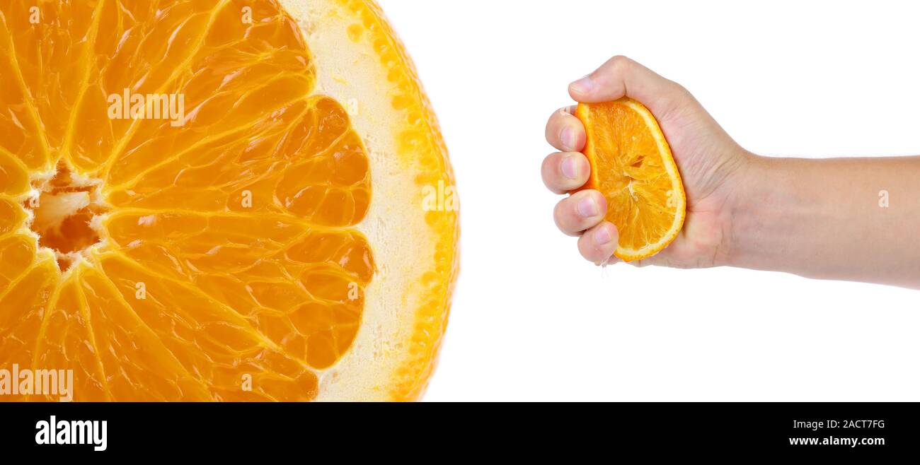 Hand press orange and macro slice Stock Photo - Alamy