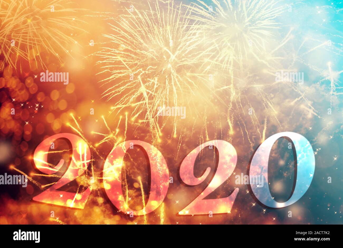 New Year 2020 celebration. Magic holiday background with fireworks ...
