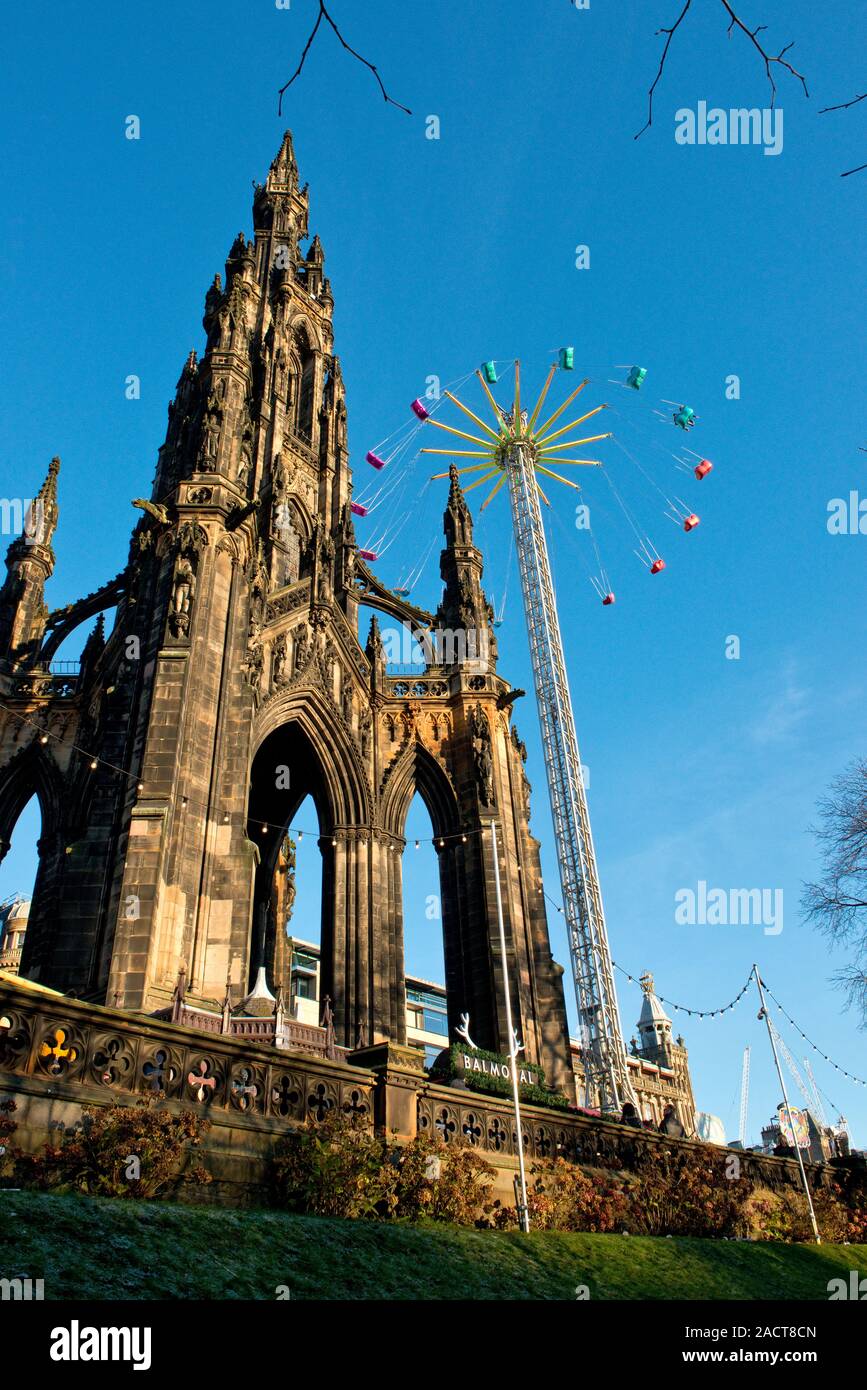 Walter Scott Monument and high Star Flyer fairground ride. Edinburgh ...