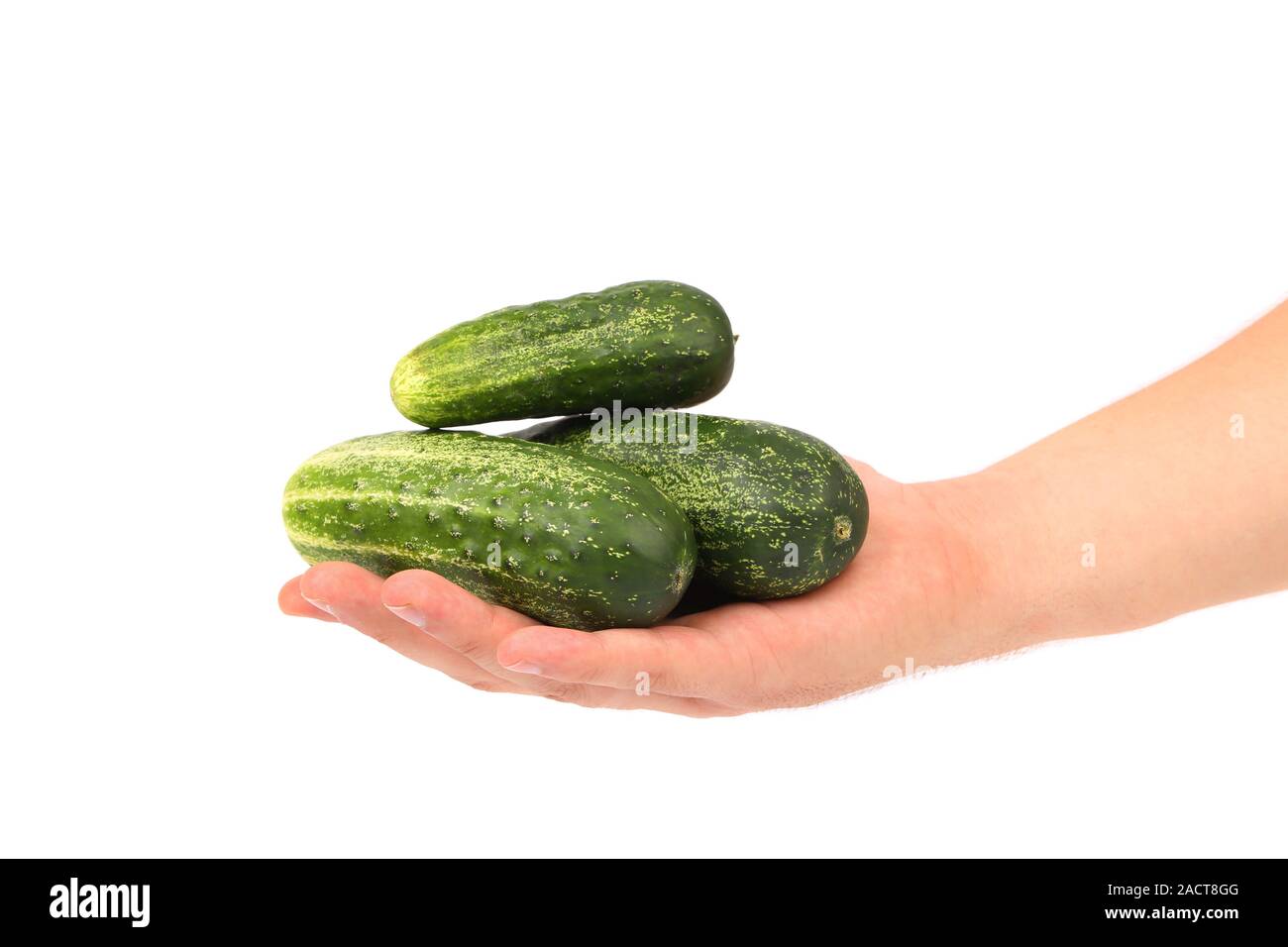 Hand with gherkin hi-res stock photography and images - Alamy
