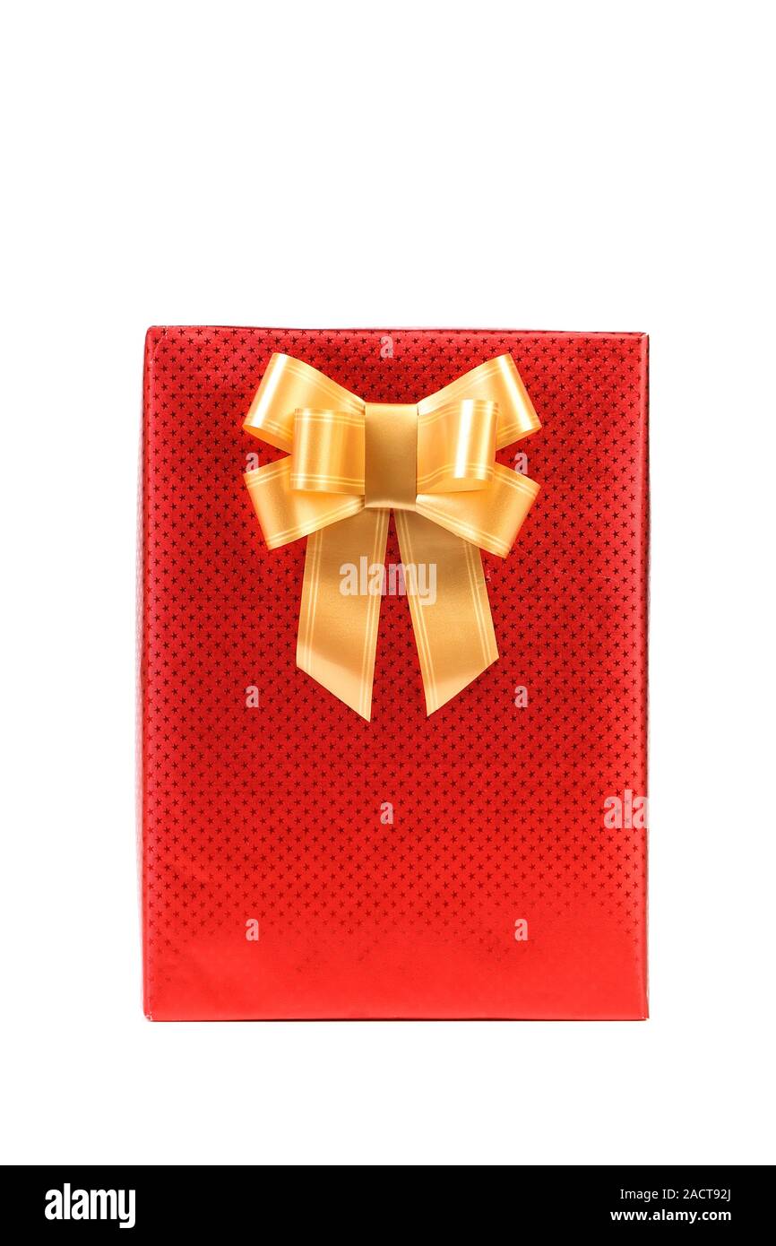 Red present box with spots and golden bow Stock Photo - Alamy
