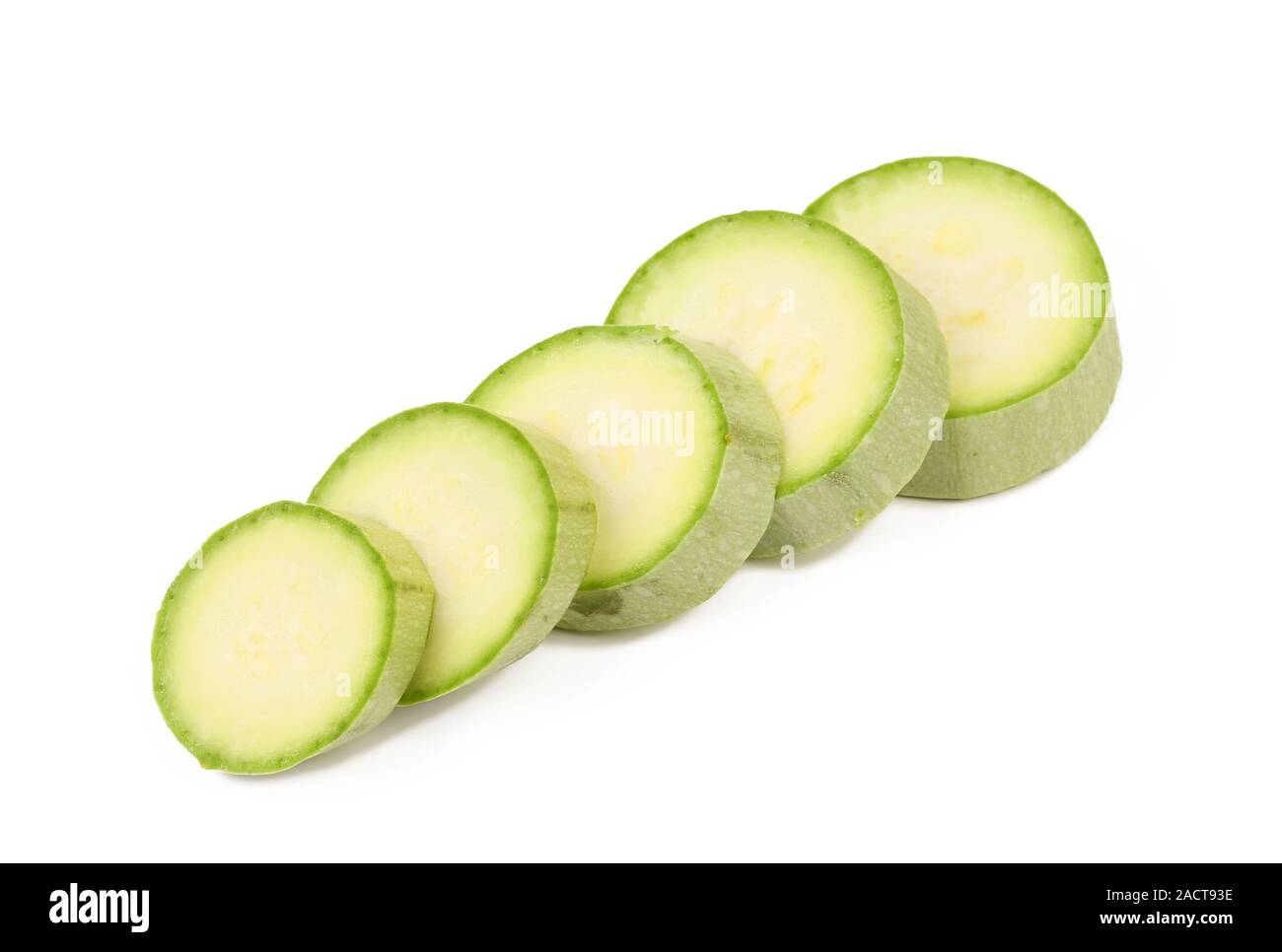 Sliced courgette whole Cut Out Stock Images & Pictures - Alamy