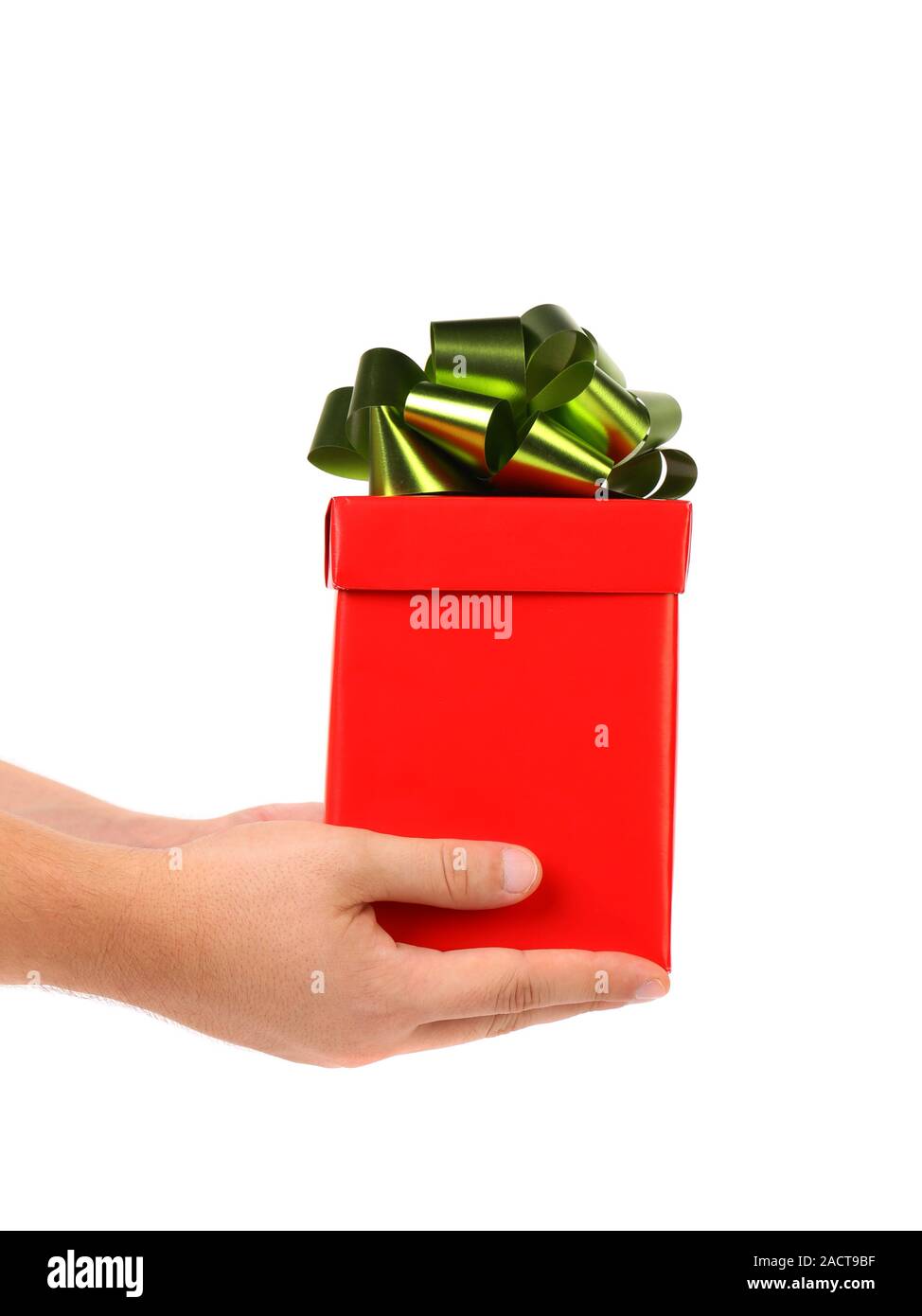 Red gift box with green-golden bow Stock Photo - Alamy