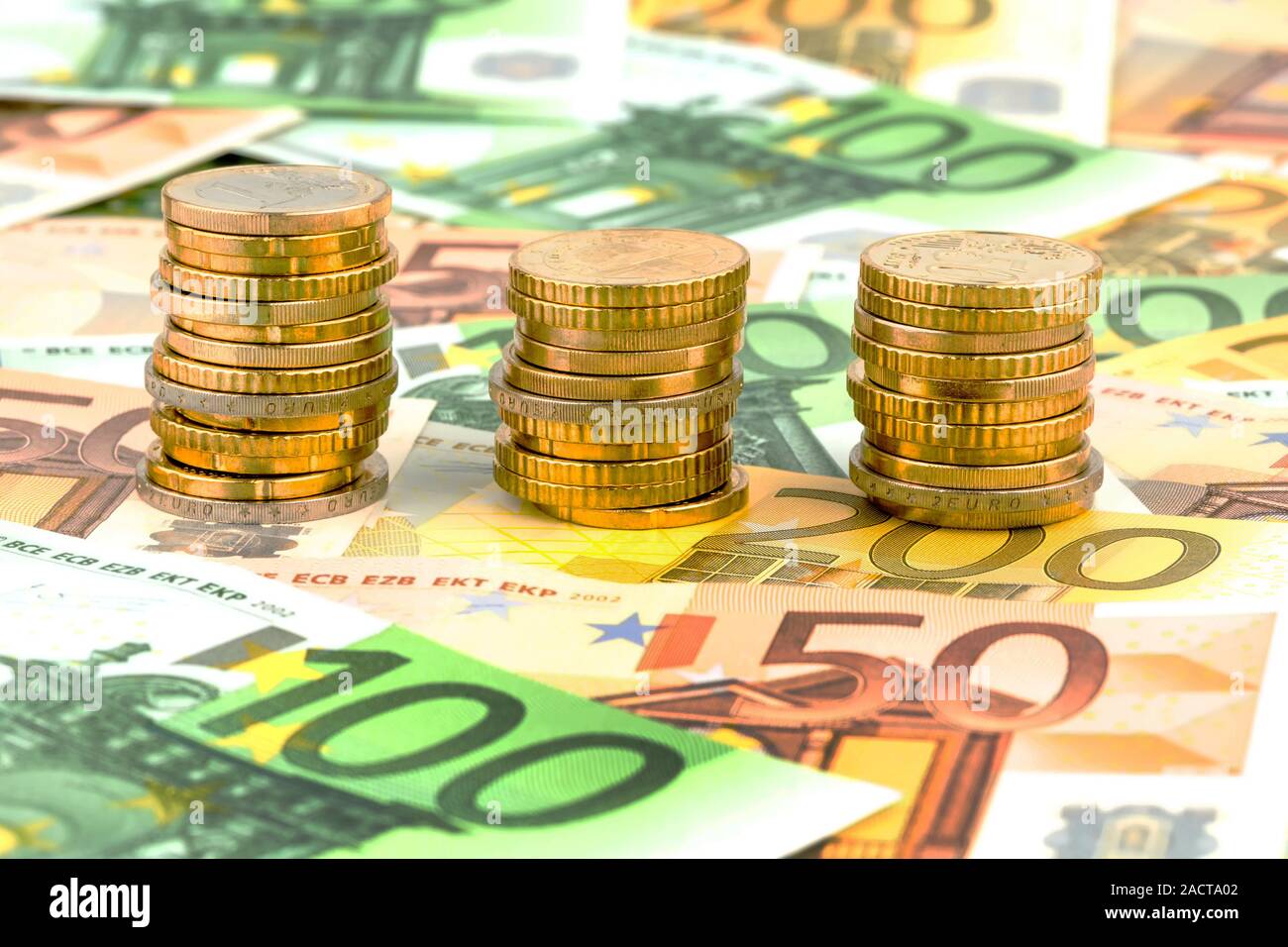 Three stacks of money coins Stock Photo - Alamy