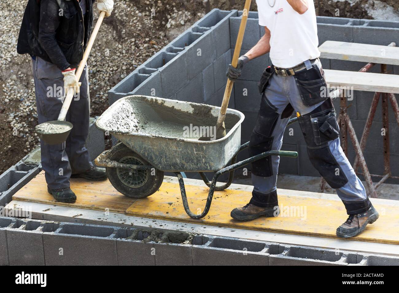 Working with concrete Stock Photo - Alamy