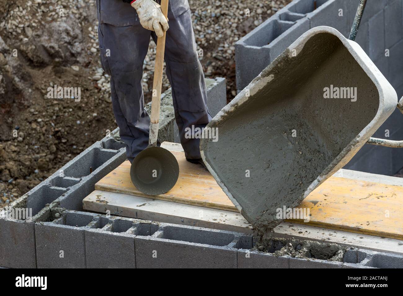 Working with concrete Stock Photo - Alamy