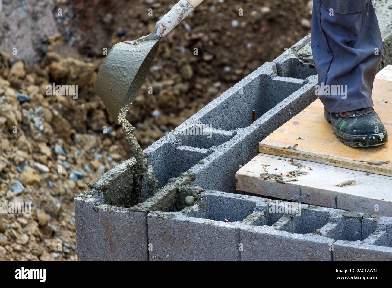 Working with concrete Stock Photo - Alamy