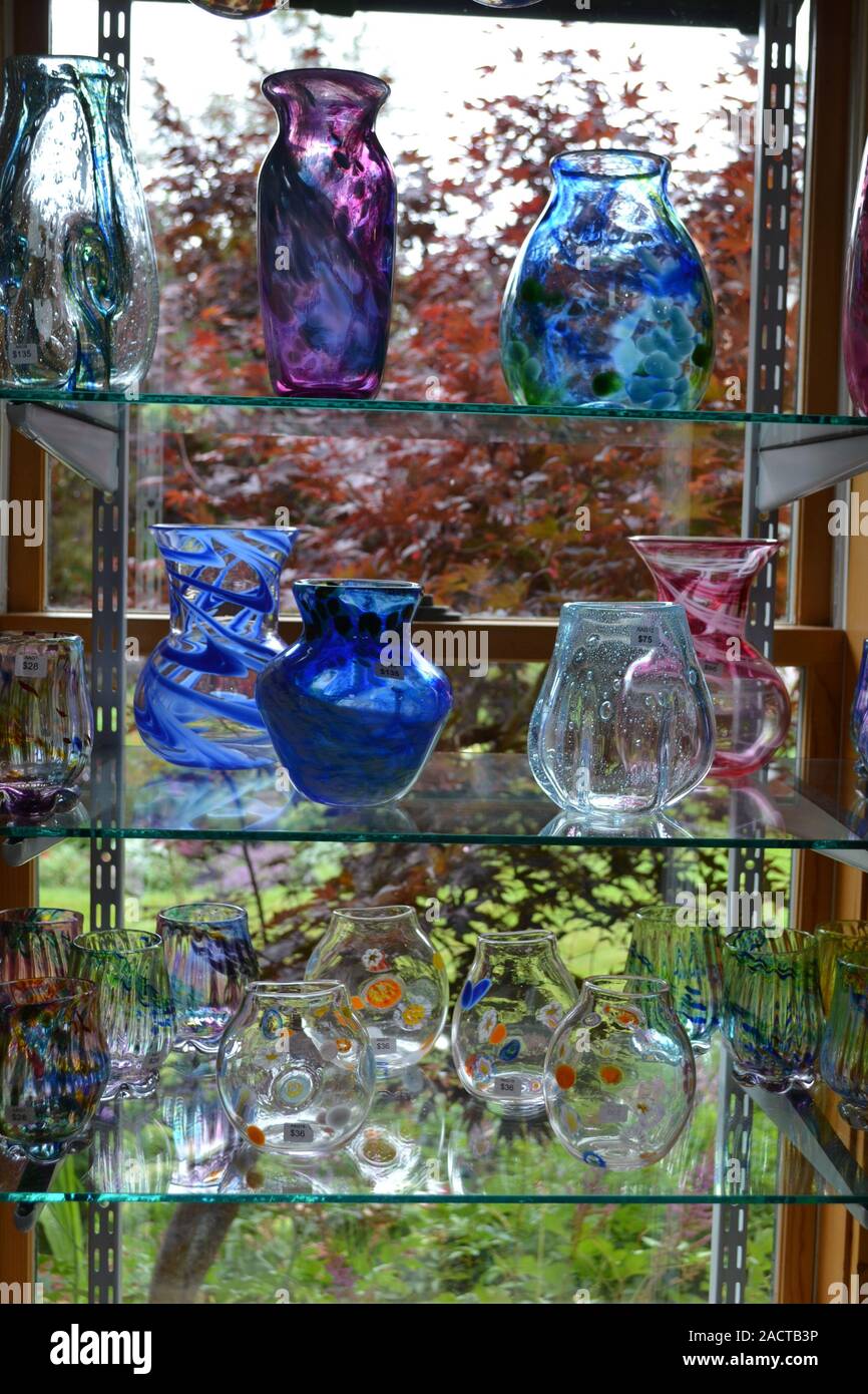 Coloured glass in Maine storefront window Stock Photo - Alamy