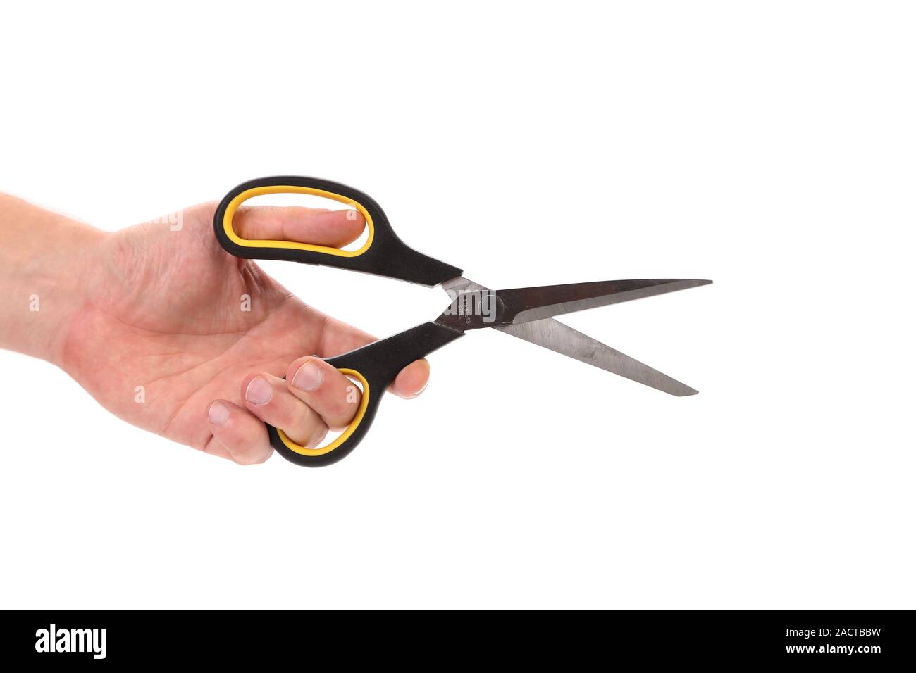 Male hand holding scissors Stock Photo - Alamy