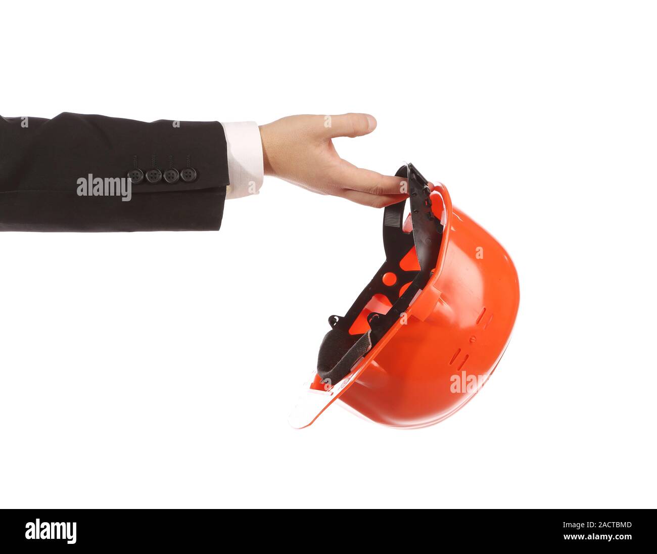 Hand holding red hard hat isolated Stock Photo - Alamy