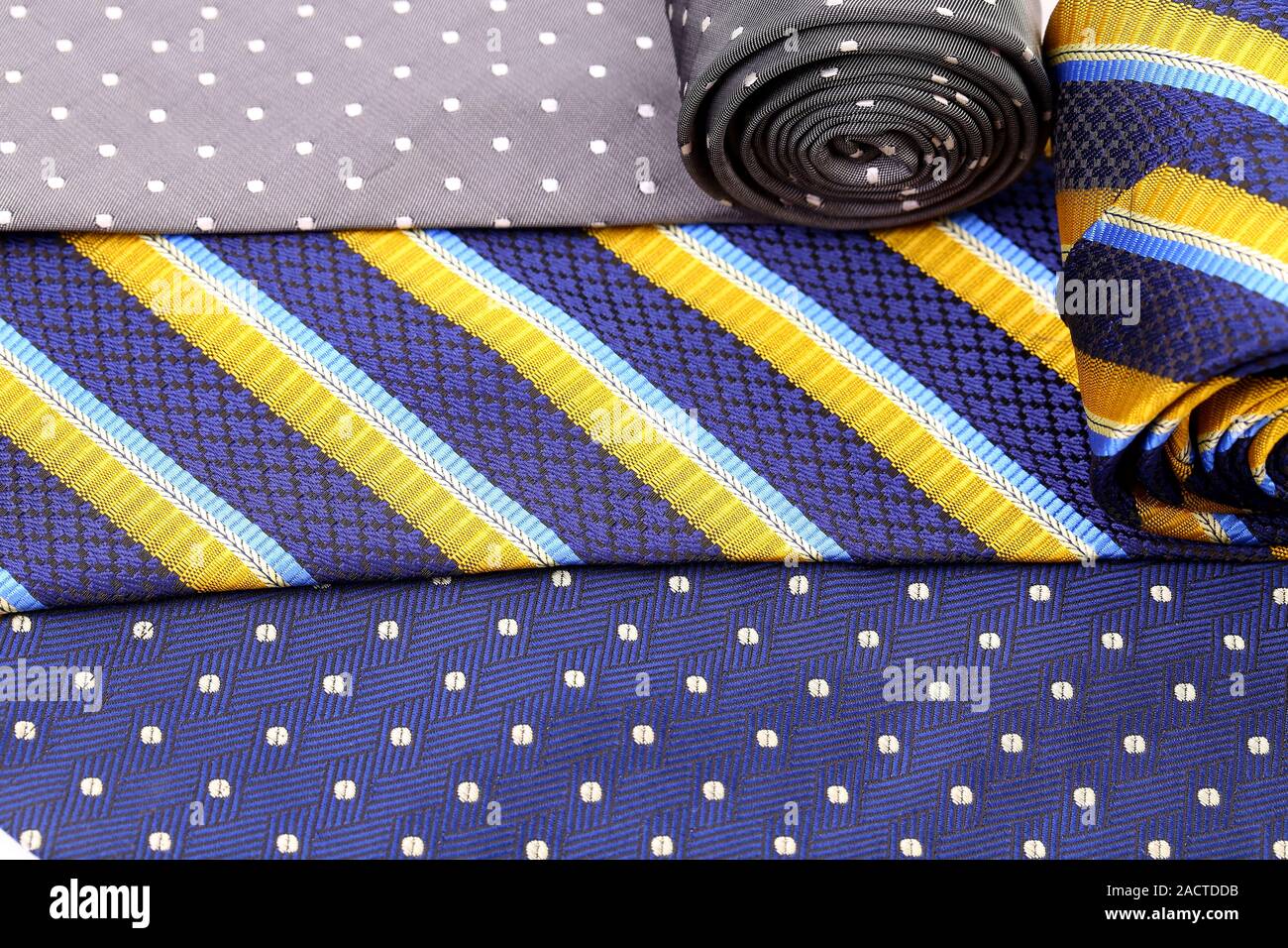 Background of three multi-colored tie Stock Photo - Alamy