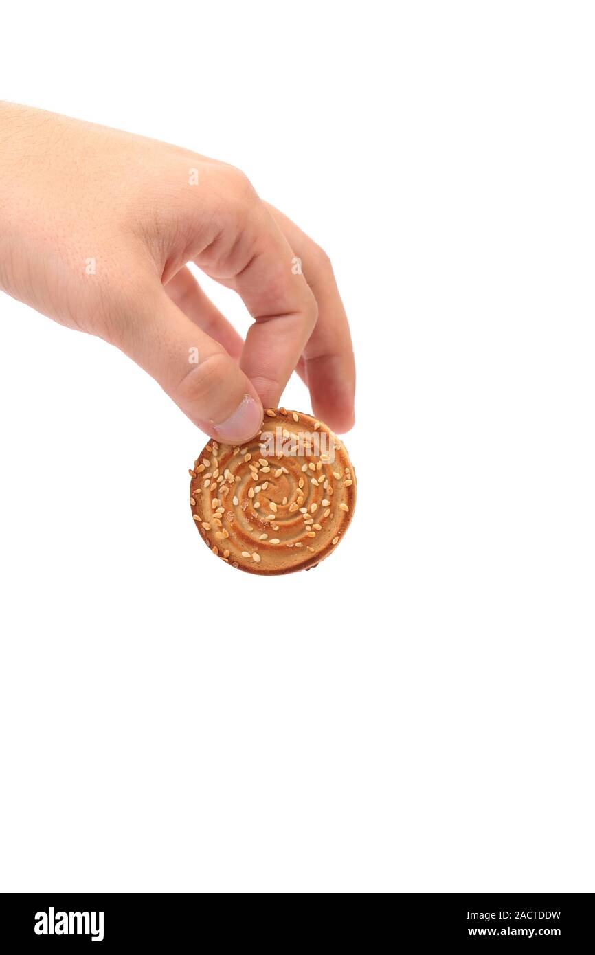 Closeup hand eating cake Cut Out Stock Images & Pictures - Alamy