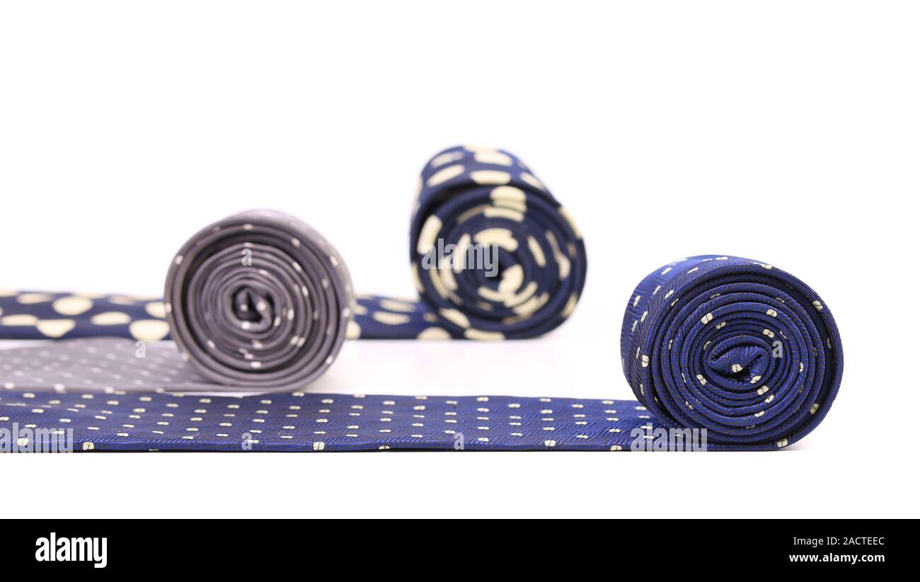 Bright rolled ties isolated Stock Photo - Alamy