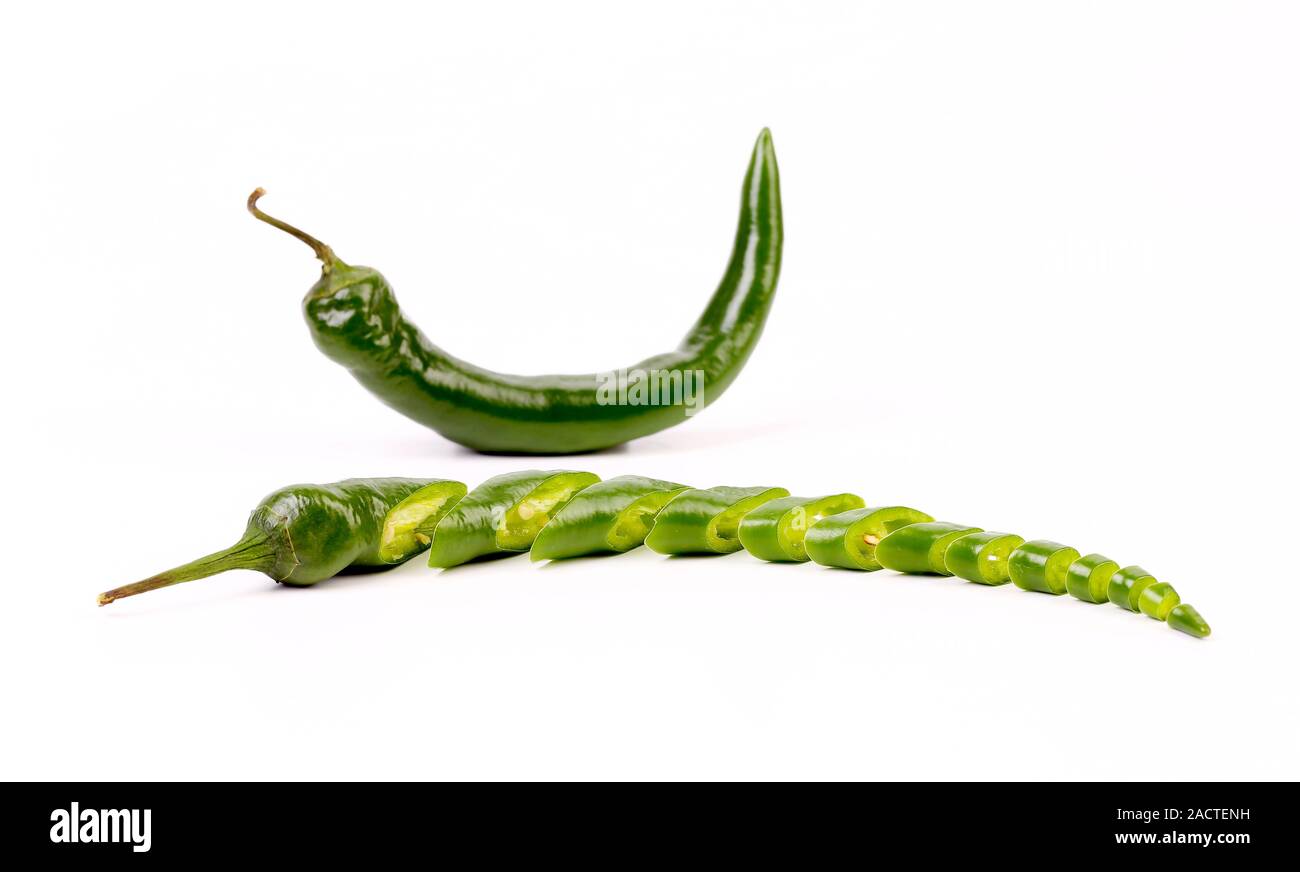 Green chilli pepper and slices Stock Photo - Alamy