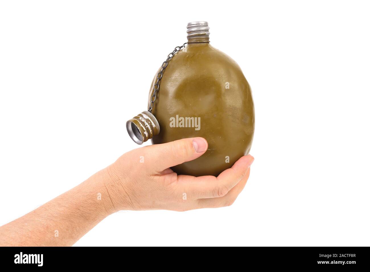 Hand holds old army canteen Stock Photo - Alamy