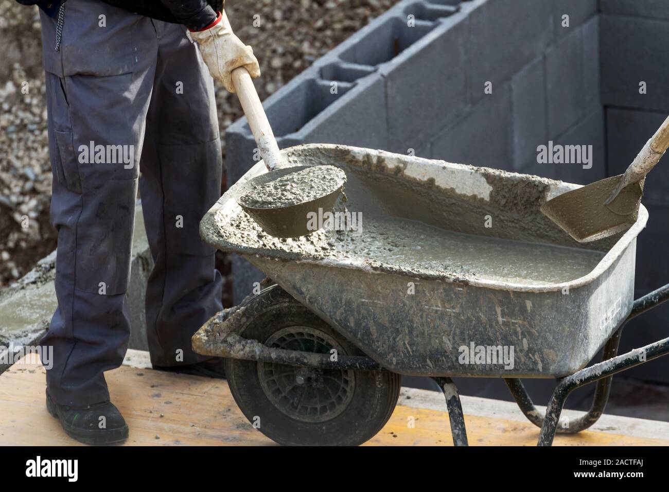 Working with concrete Stock Photo - Alamy