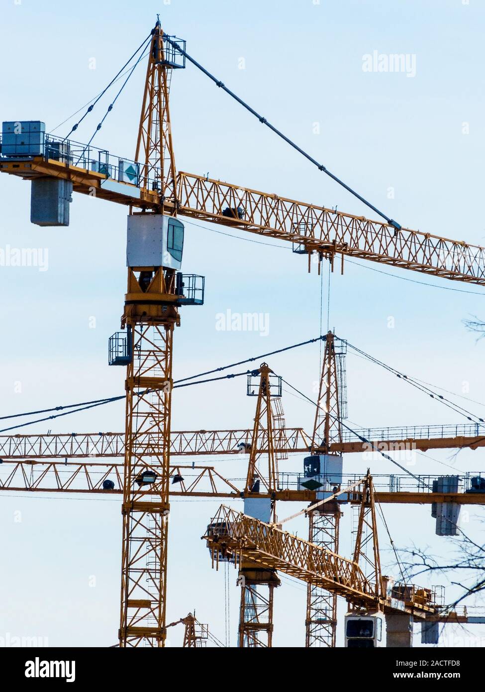 Several construction cranes hi-res stock photography and images - Alamy