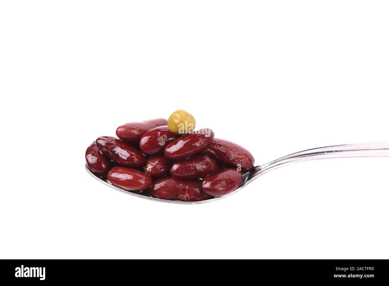 Preserve beans on a spoon Stock Photo - Alamy