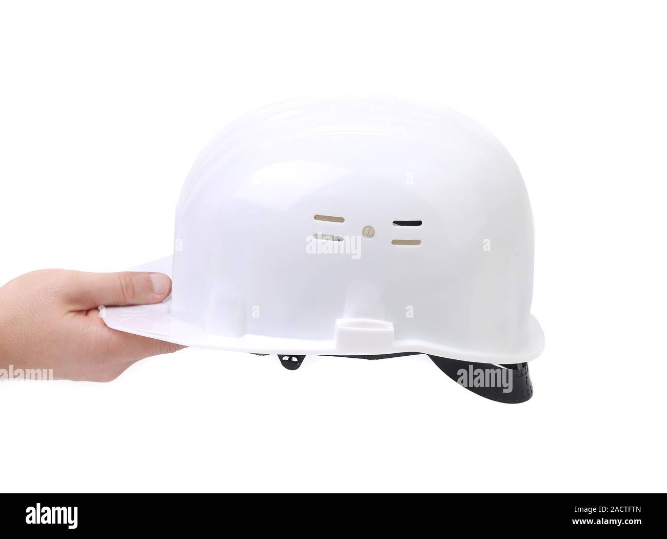 Hand holding orange hard hat Stock Photo - Alamy