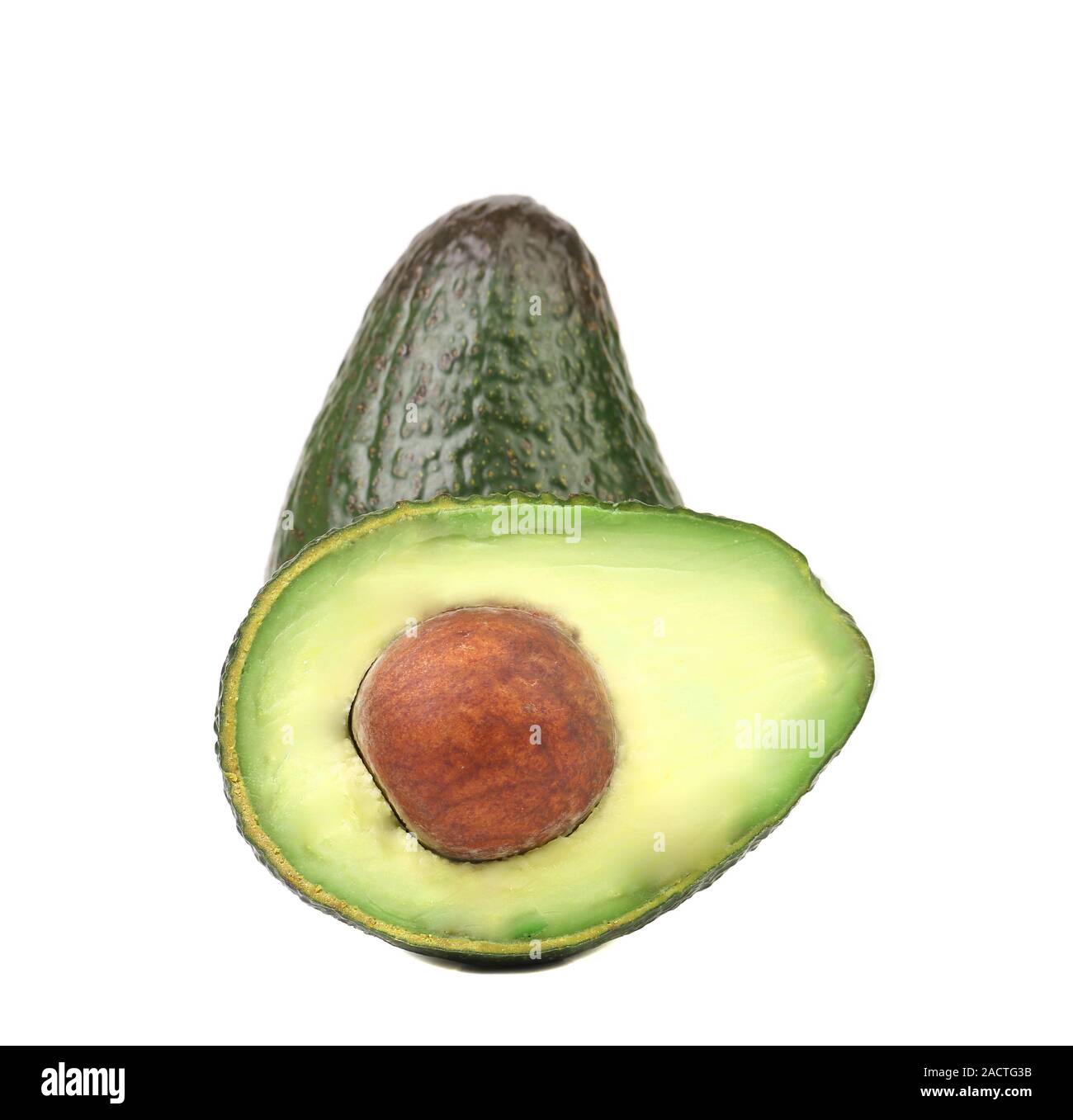 Fresh avocado cut in half Stock Photo - Alamy