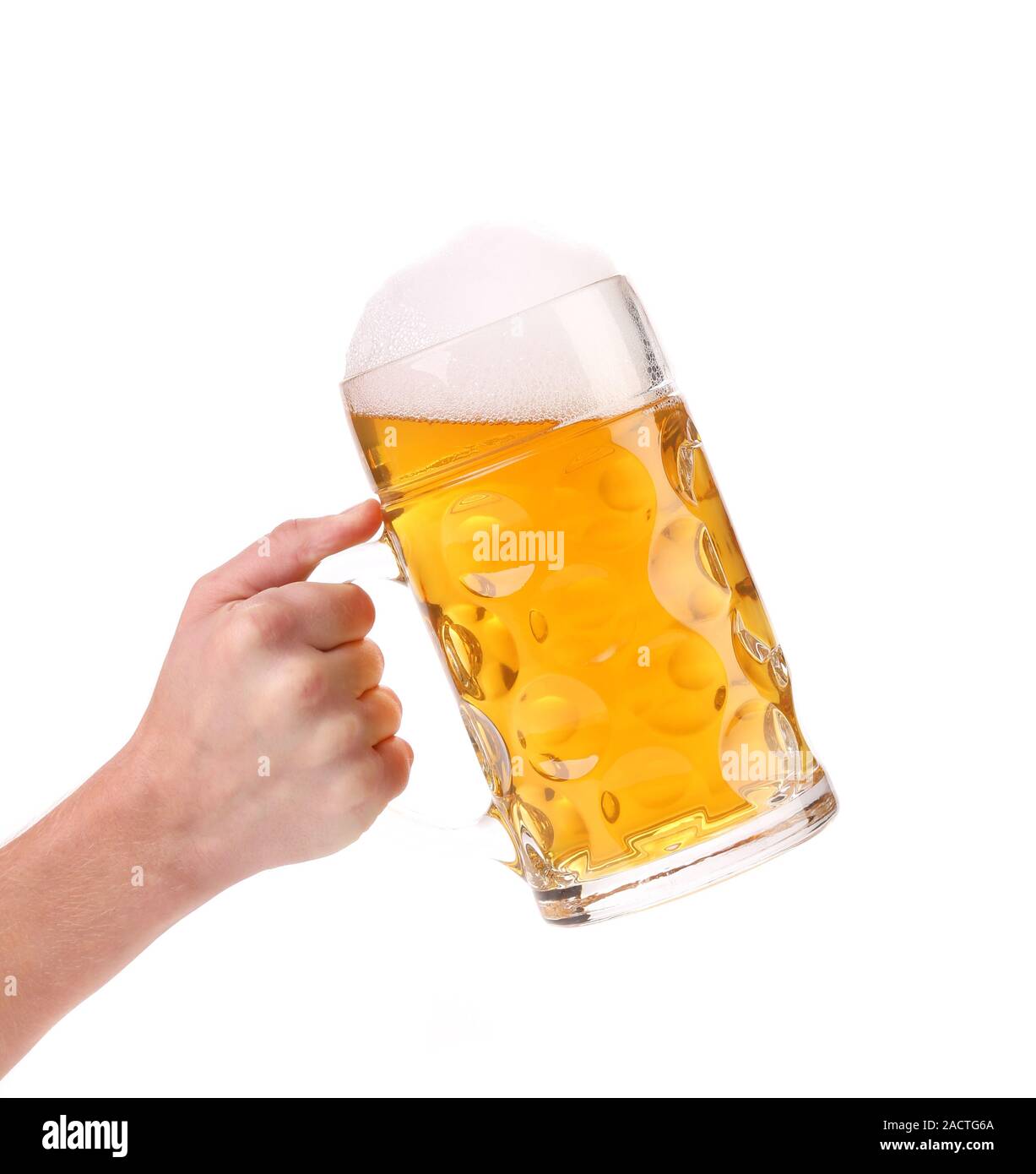 Full beer mug in hand Stock Photo - Alamy