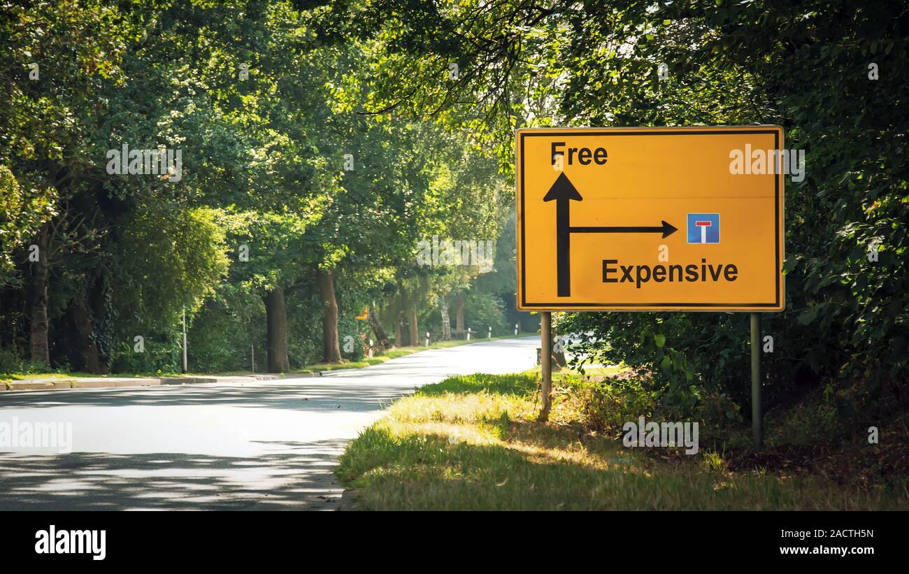 Street Sign the Direction Way to Free versus Expensive Stock Photo - Alamy