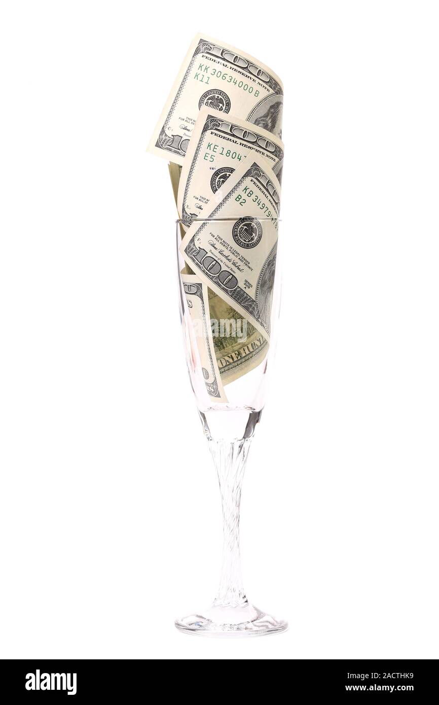 Glass with money Stock Photo - Alamy