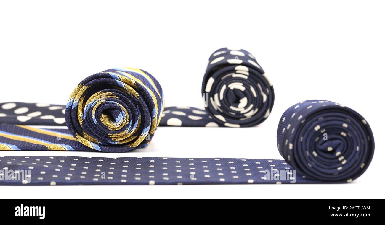Bright rolled ties isolated on white Stock Photo - Alamy