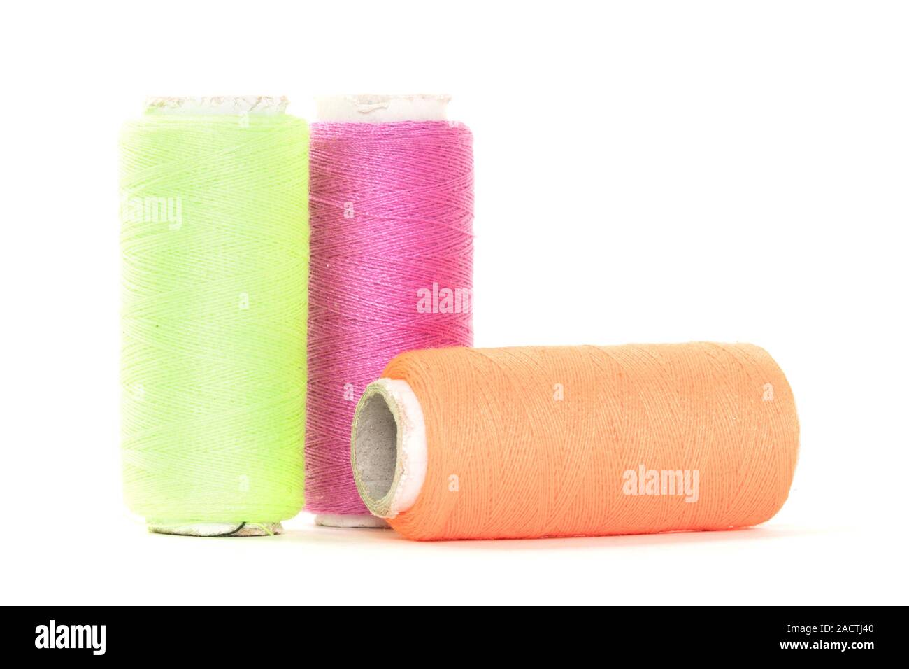 Color sewing thread with needle, isolated on a white background Stock ...