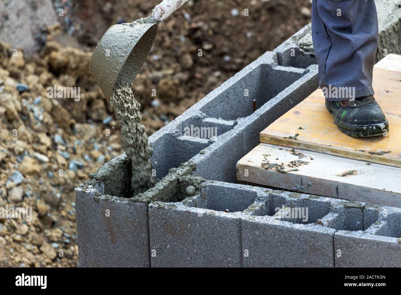 Working with concrete Stock Photo - Alamy