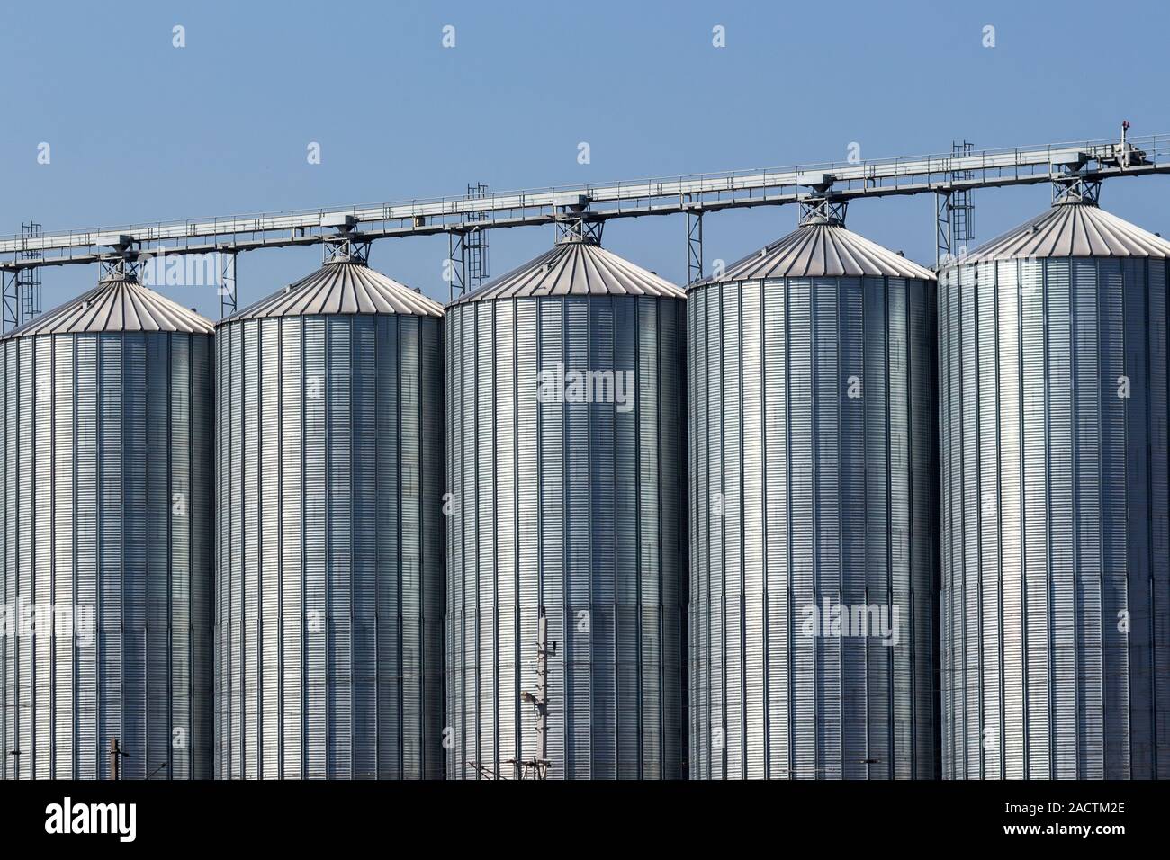 Silos in a warehouse Stock Photo - Alamy