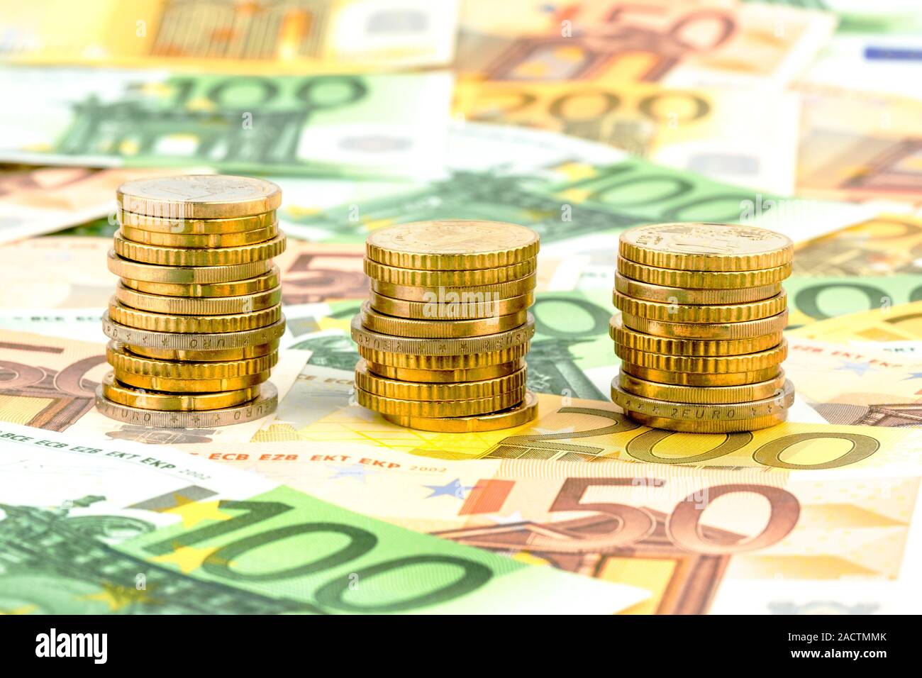 Three stacks of money coins Stock Photo - Alamy