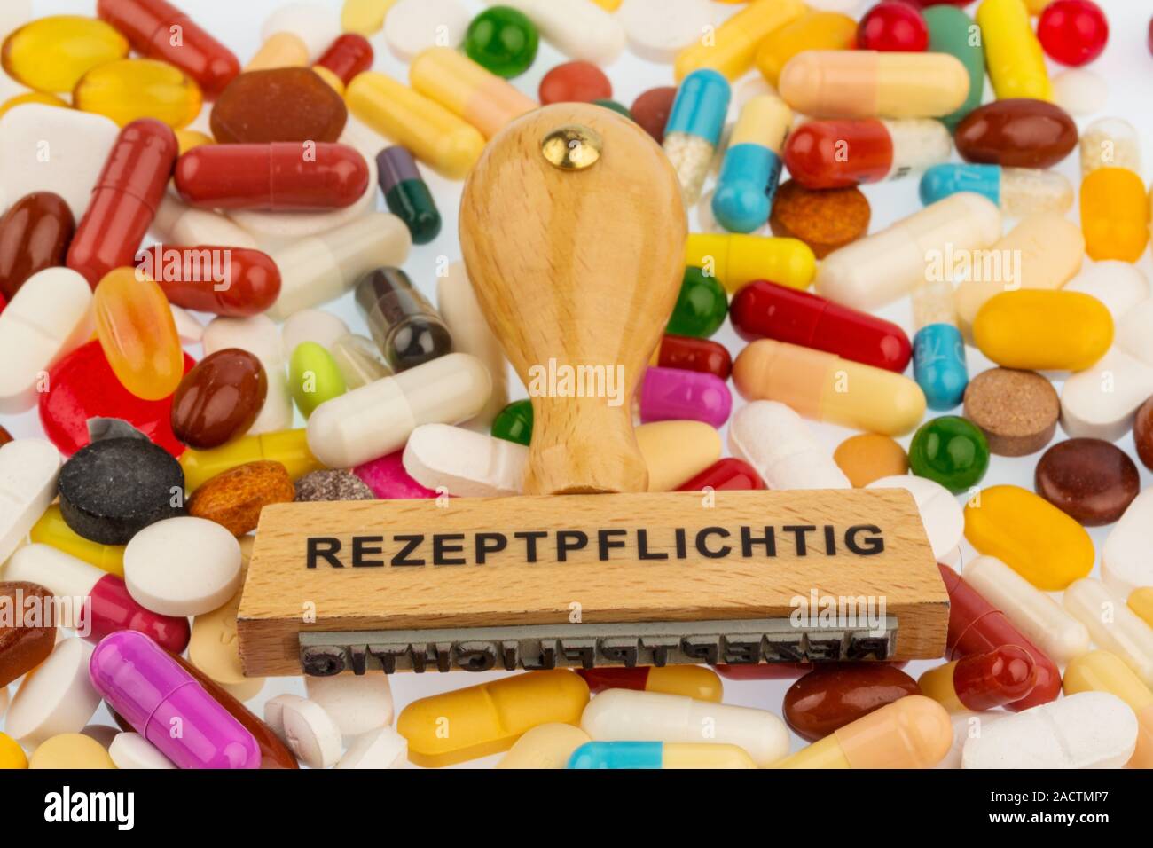 Stamps on coloured tablets Stock Photo - Alamy