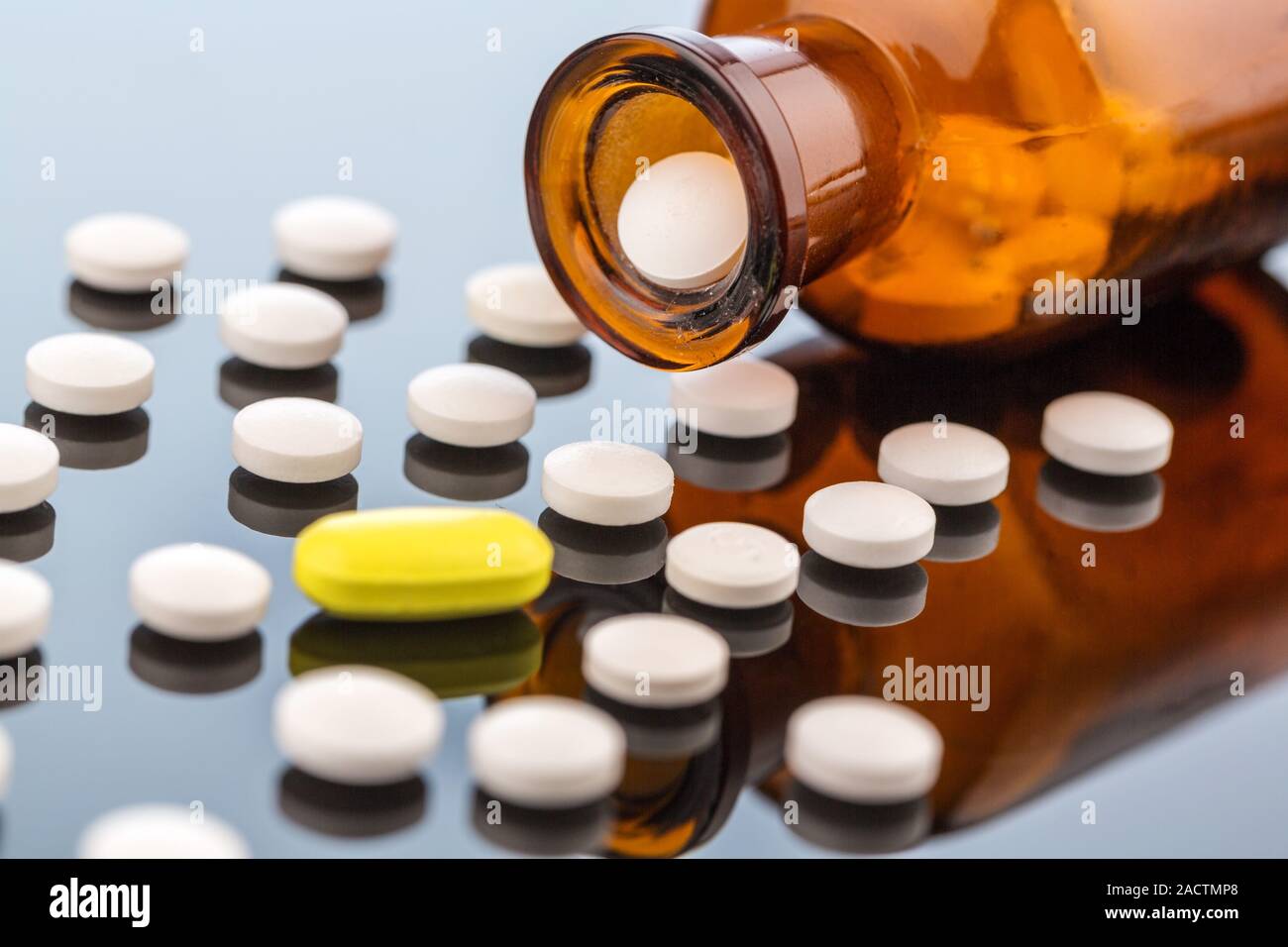 Many tablets with container Stock Photo - Alamy