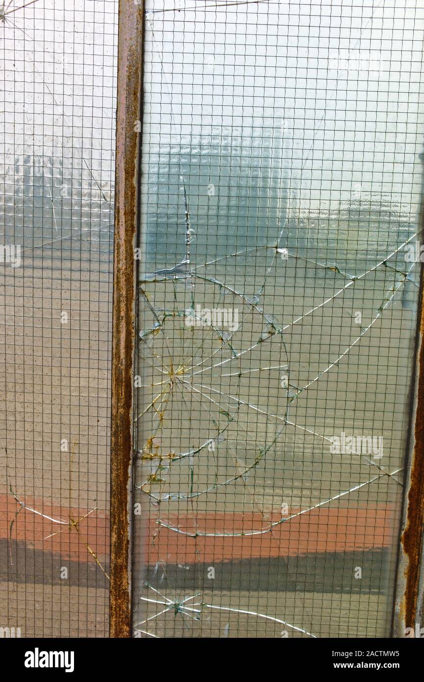 Damaged window glass hi-res stock photography and images - Alamy