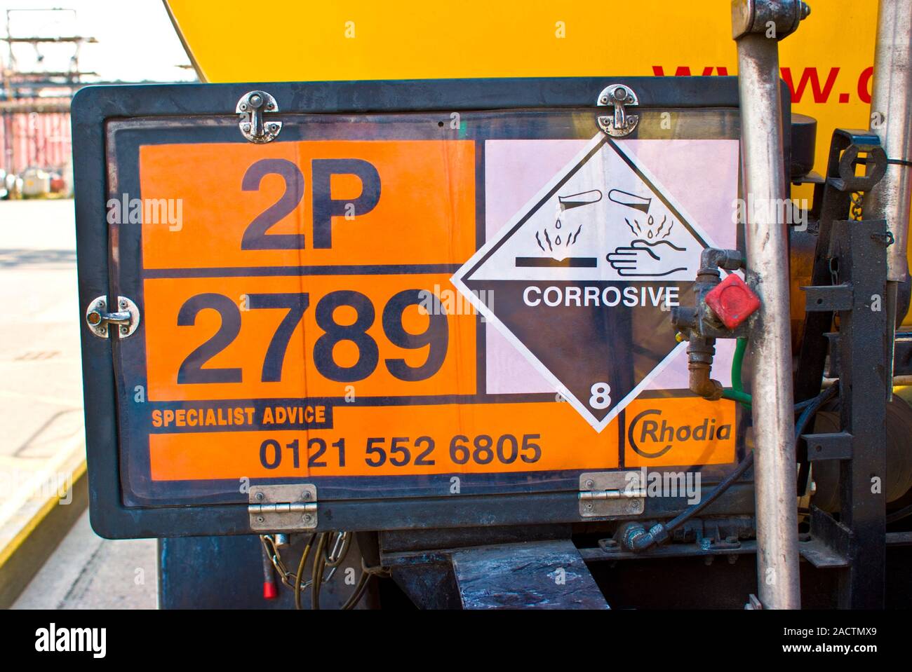 Chemical road tanker warning signs. Industrial chemicals are ...
